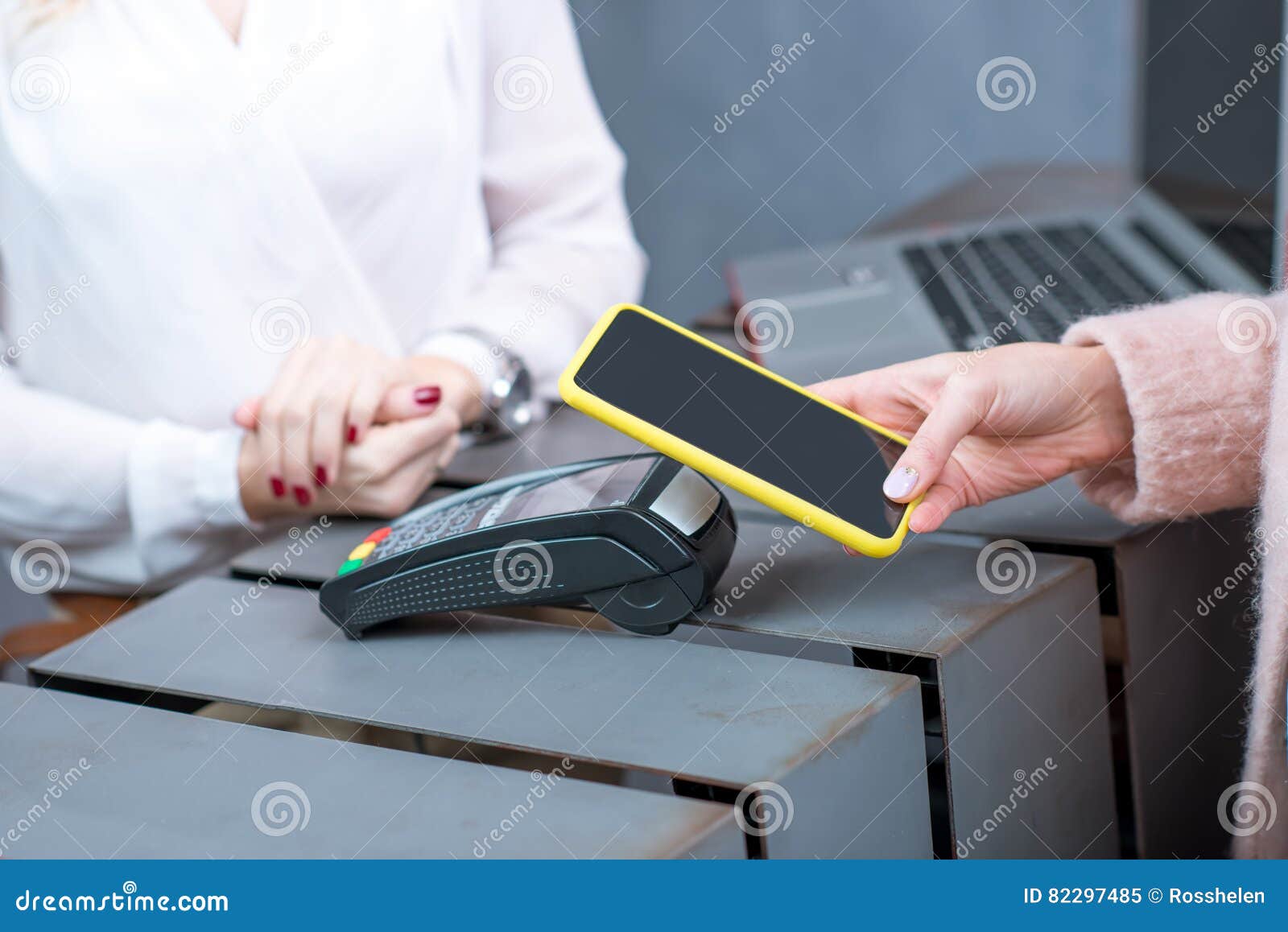 Paying with mobile phone stock image. Image of finance - 82297485