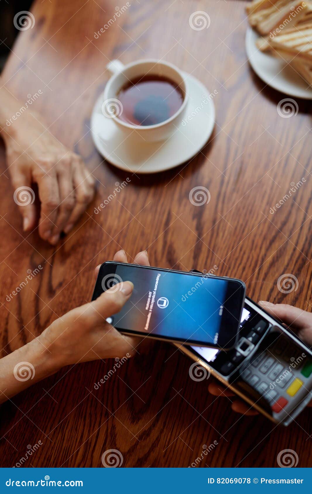 Payment in cafe stock photo. Image of cashier, mobile - 82069078