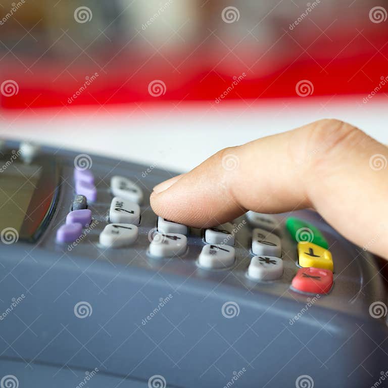 Payment Terminal with Keypad and a Finger Pressing on Button Stock ...