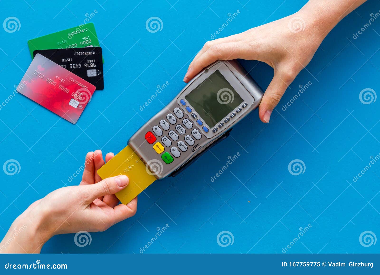 Payments in Shops. Hand Insert Bank Card in Terminal on Blue Background ...