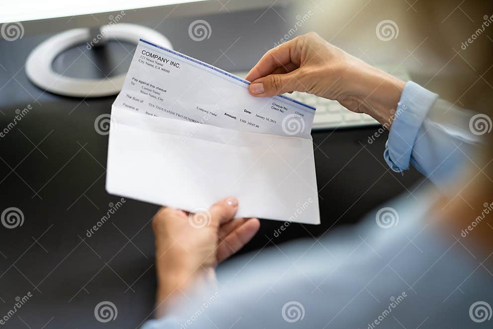 Payroll Cheque in Envelope stock image. Image of insurance - 255604193