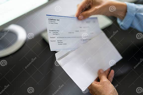 Payroll Cheque in Envelope stock photo. Image of office - 256119438
