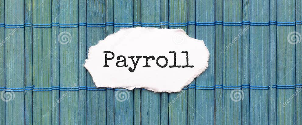 PAYROLL Text on the Piece of Paper on the Green Wood Background Stock ...