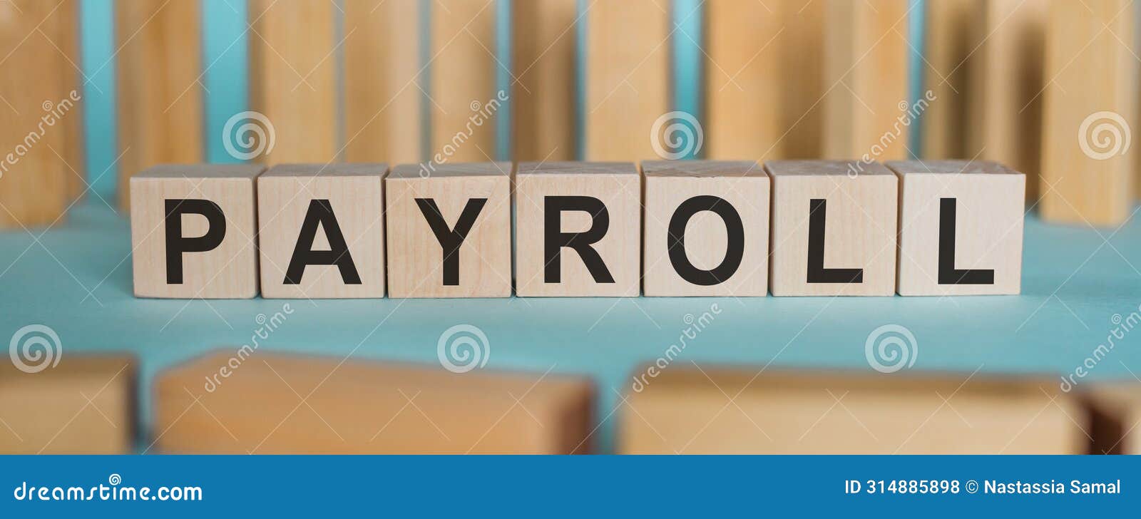 PAYROLL Word Written on Wooden Blocks on Light Blue Background Stock ...