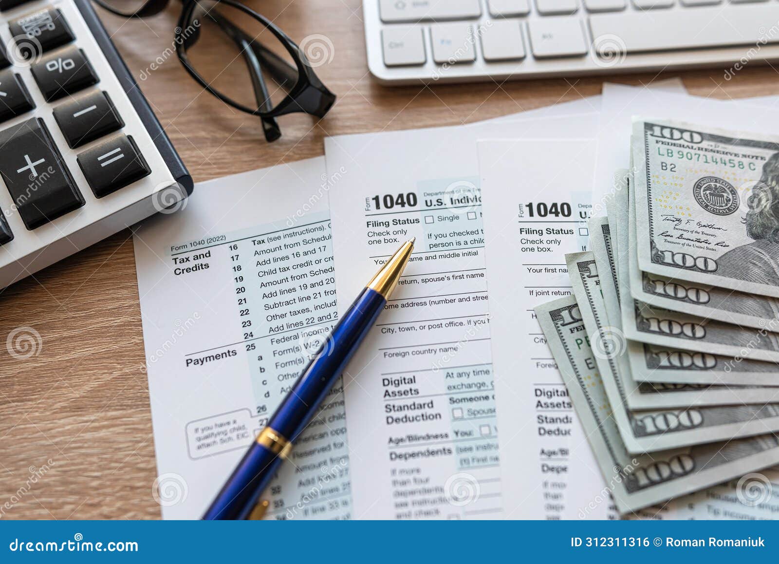 PC Keyboard US Dollar Pen 1040 Tax Form on Office Table Desktop ...