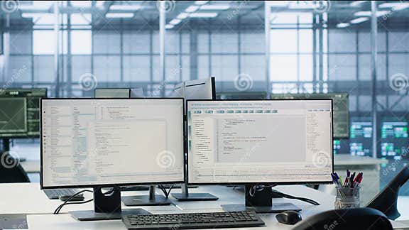 PC Monitors on Desk Used for Checking Potential System Failures in ...