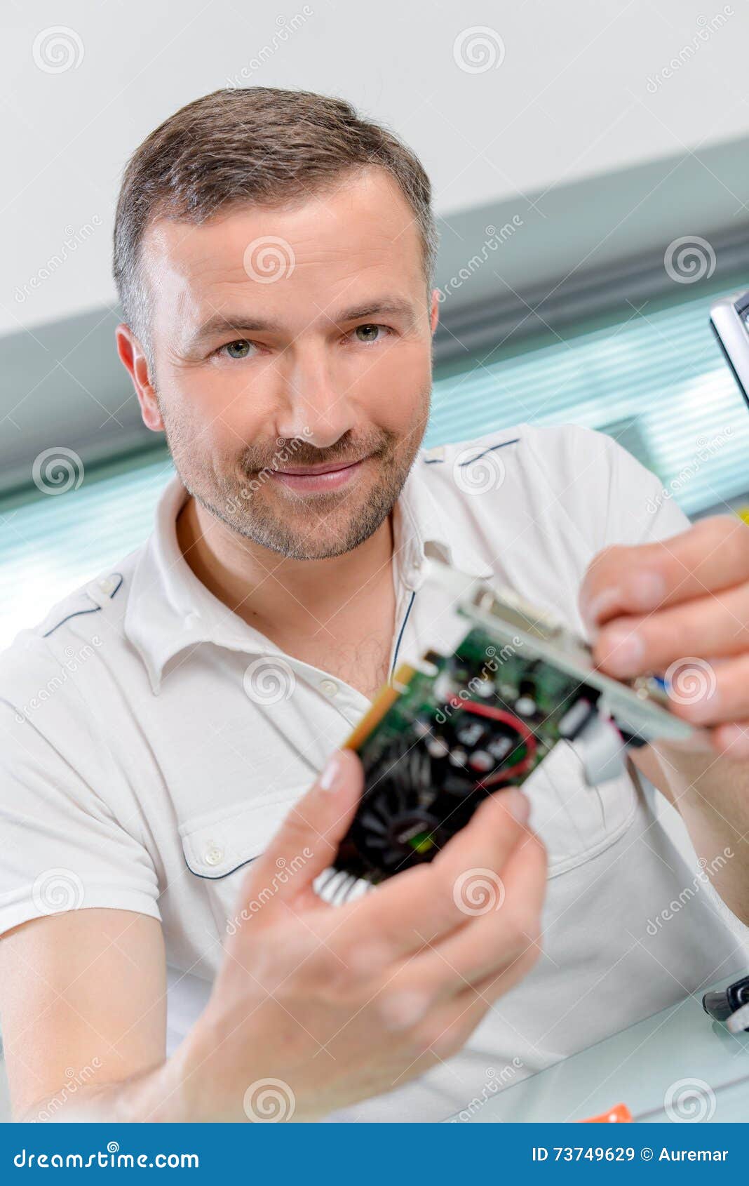 PC Repair Man Holding Graphics Card Stock Image - Image of modern ...