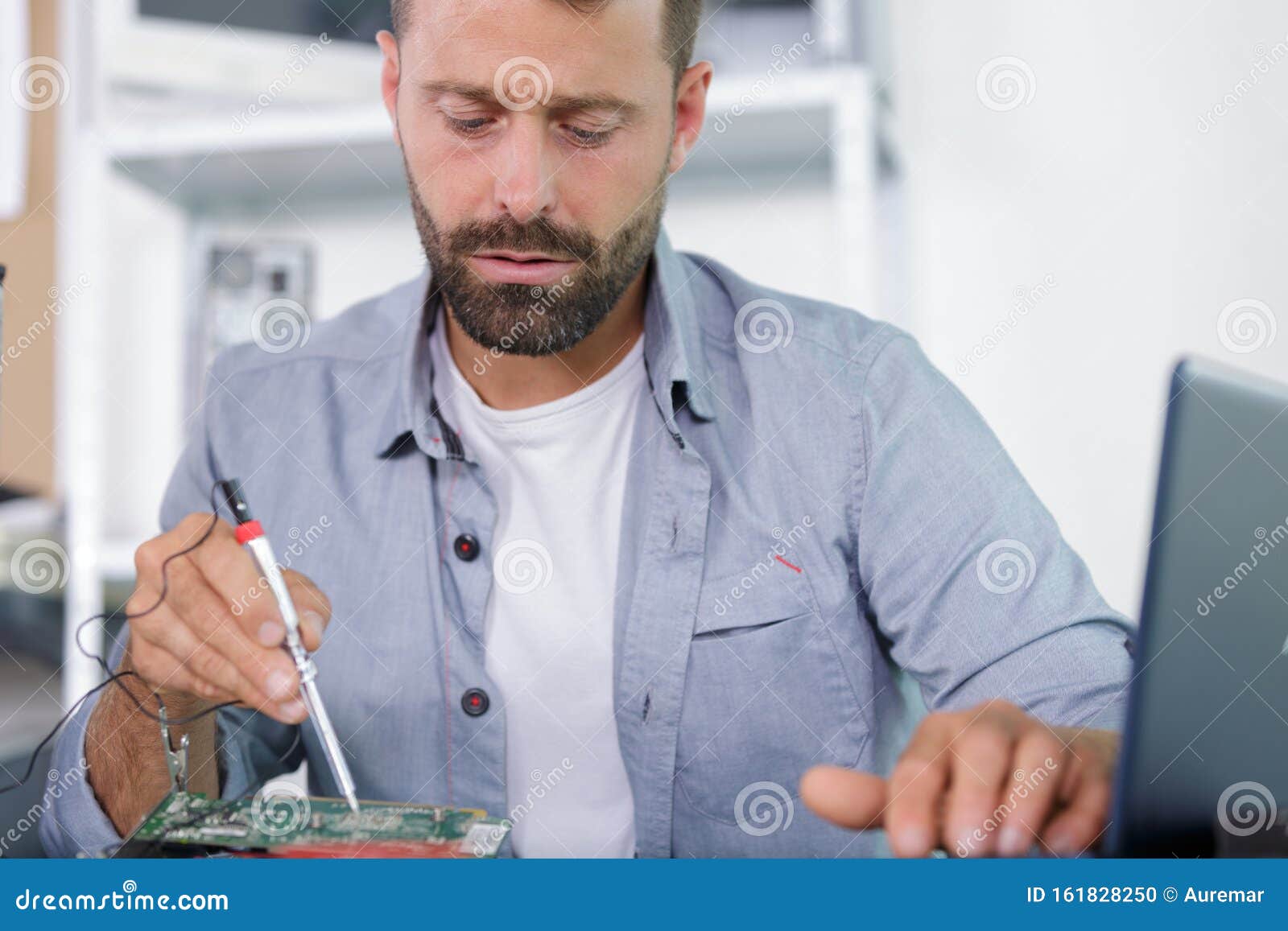 Pc technician at work stock photo. Image of service - 161828250