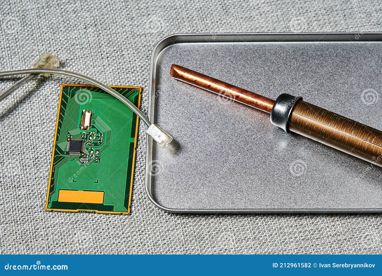 PCB with a Microchip, Connectors, Wires, Soldering Iron in the ...