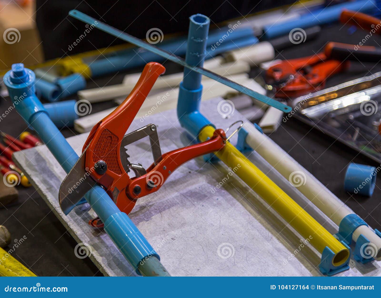 PCV Pipe Scissor stock photo. Image of pipe, erection - 104127164