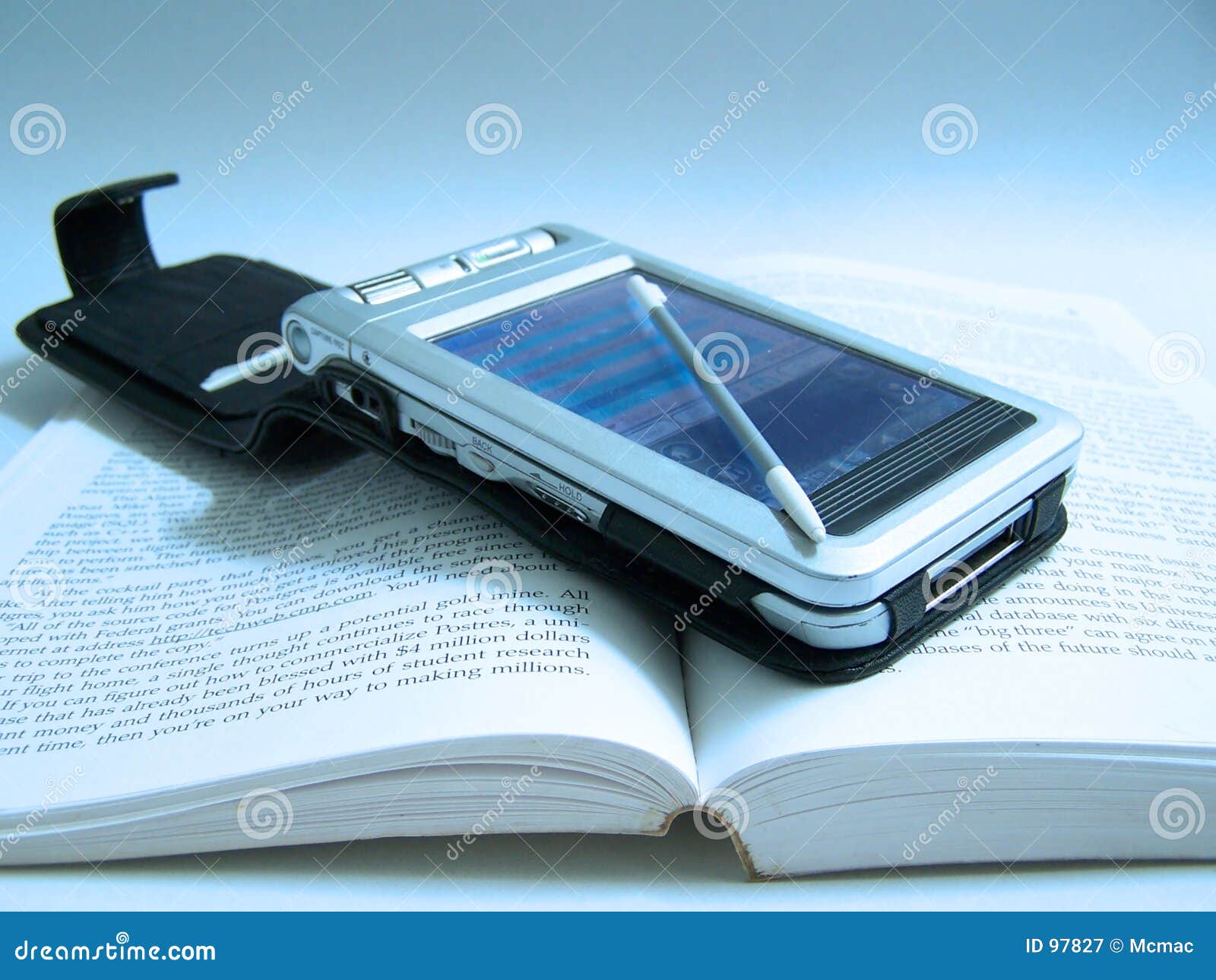 PDA on a Book stock image. Image of computer, money, mini - 97827