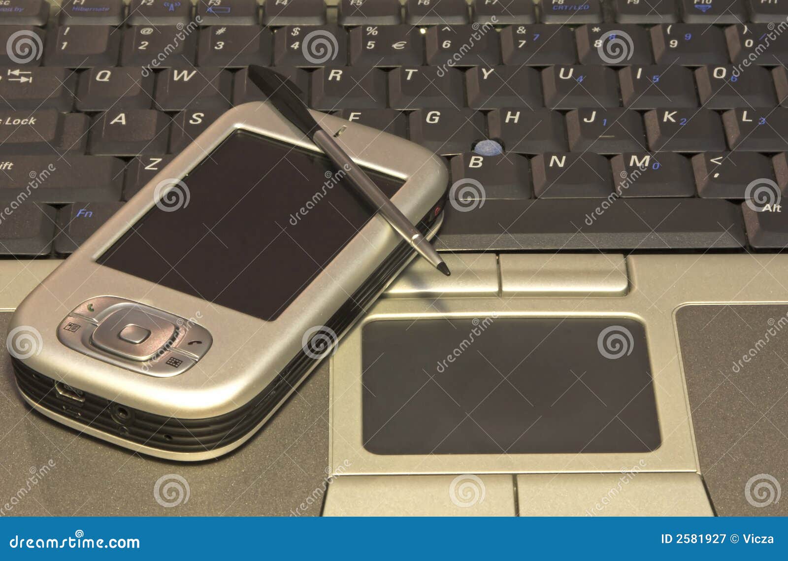 PDA and Laptop #02 stock image. Image of keypad, silver - 2581927