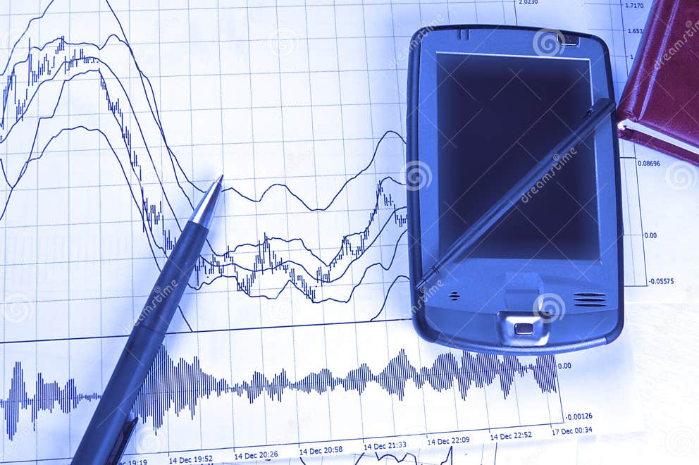 PDA and pen on stock chart stock photo. Image of computer - 3929564