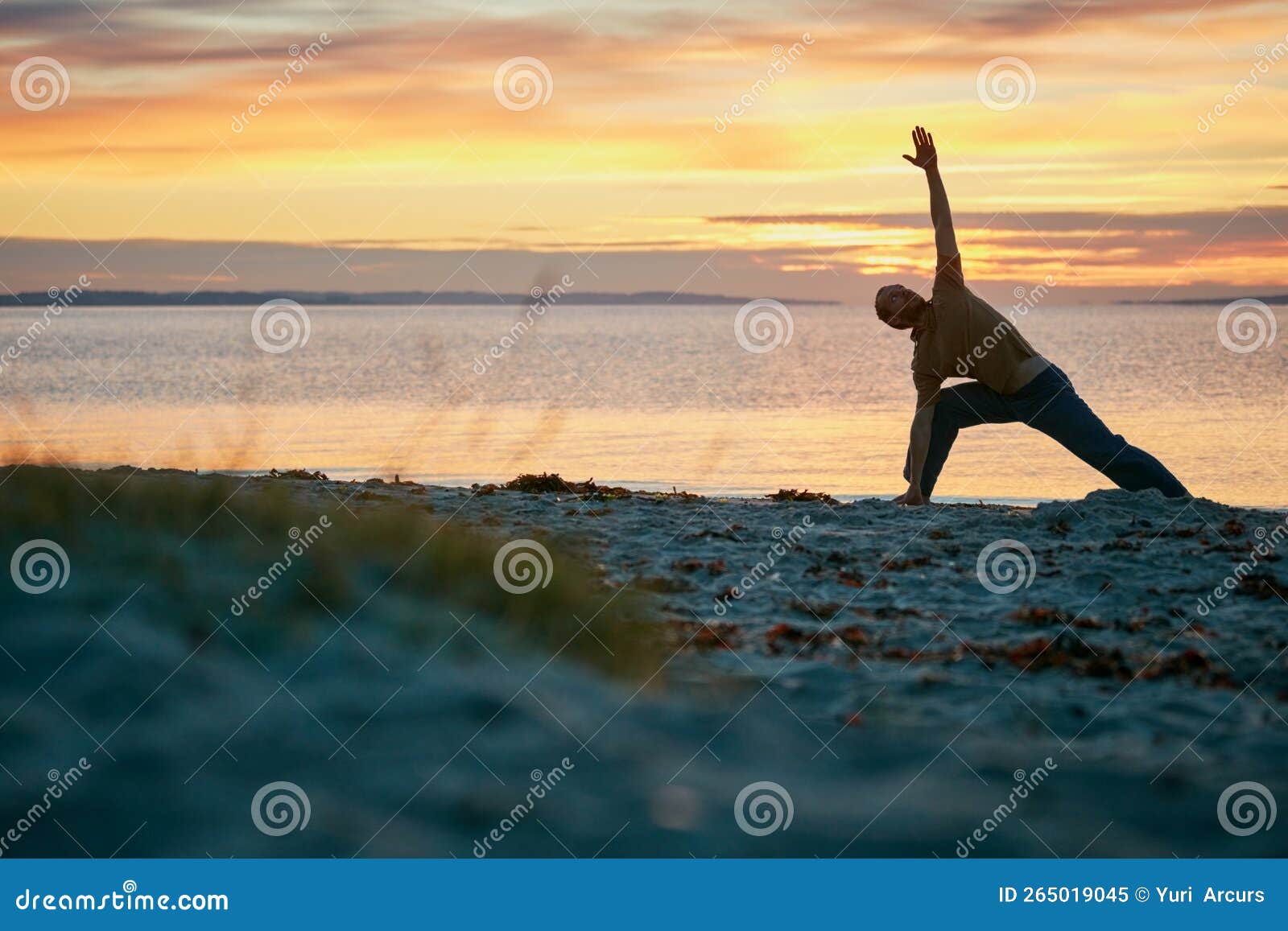 Peace is Also a Super Power. a Man Practicing the Triangle Pose during ...