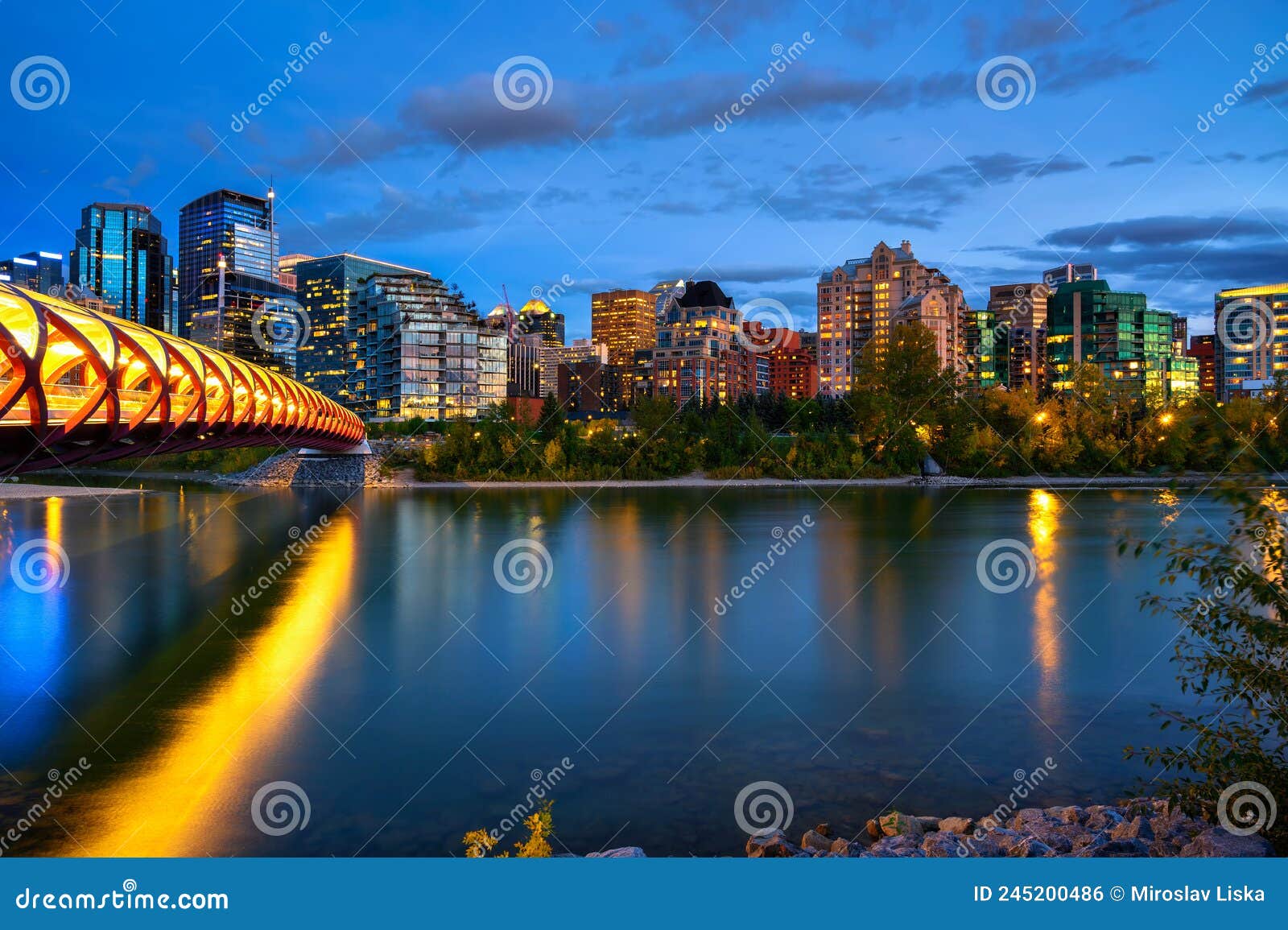 Peace Bridge Across the Bow River and Calgary Skyline Photographed at ...