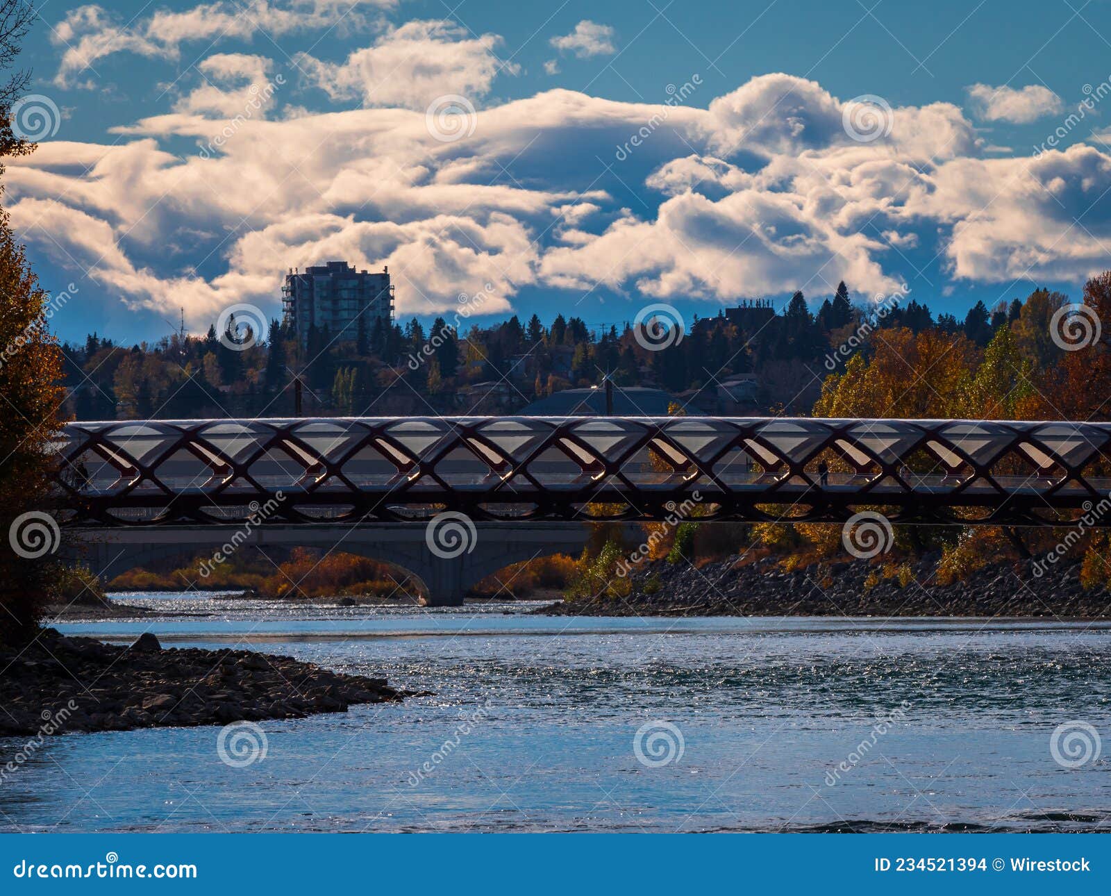Peace Bridge Over the Bow River with a Beautiful Skyline in Calgary ...