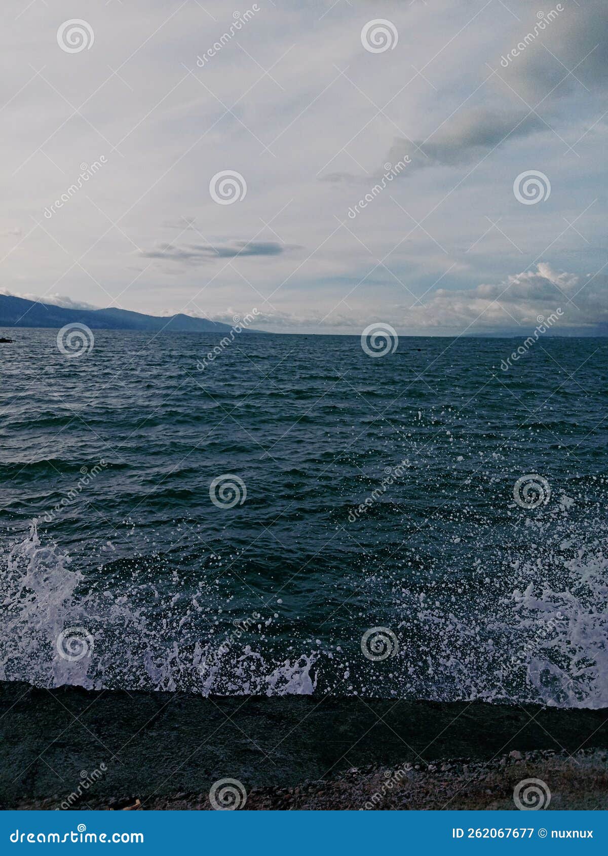 At Peace with the Roar of the Waves in the Blue Sky with You. Stock ...