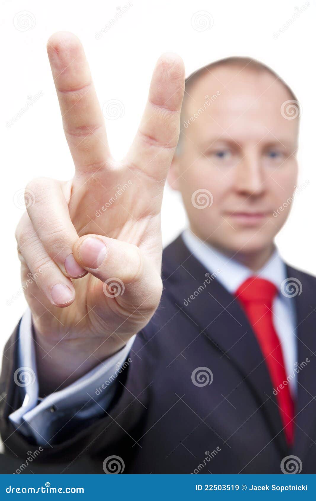 Peace sign by businessman stock image. Image of suit - 22503519