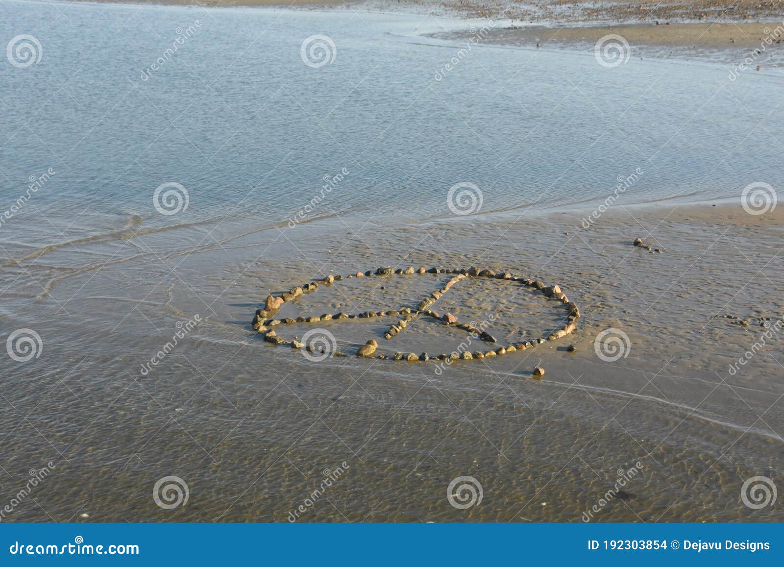 Peace Sign Made Out of Rocks on a Beach Stock Photo - Image of ...