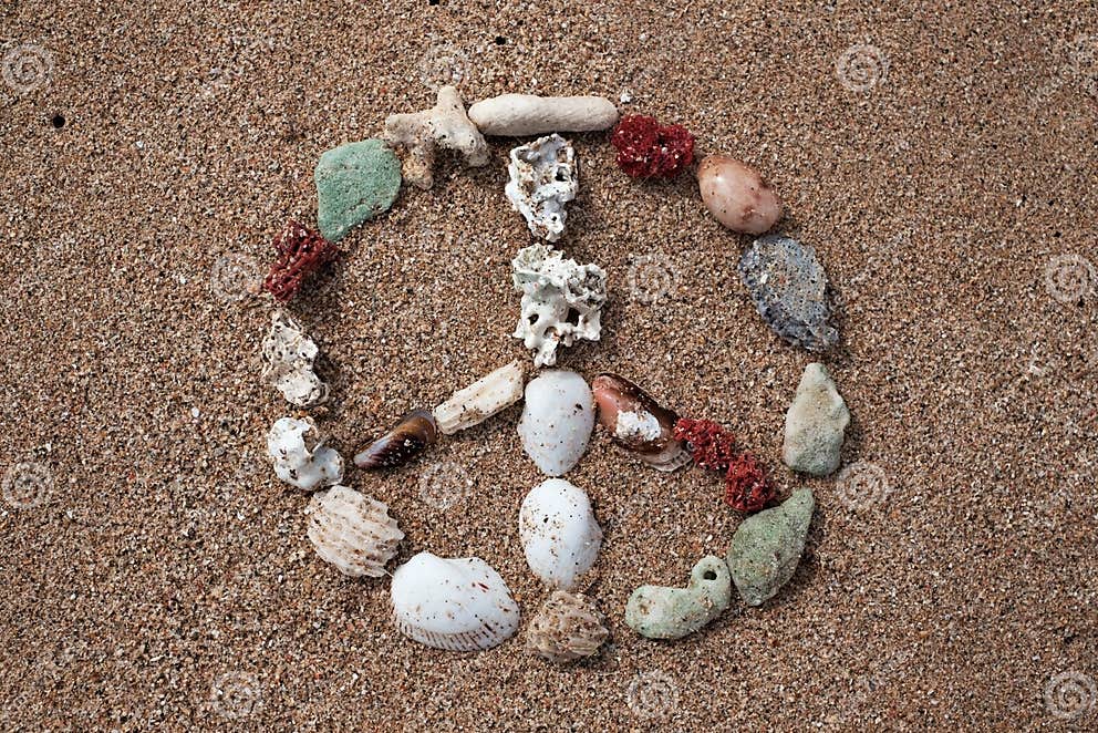 Peace Sign Made with Shells on Ocean Beach. Stock Photo - Image of ...