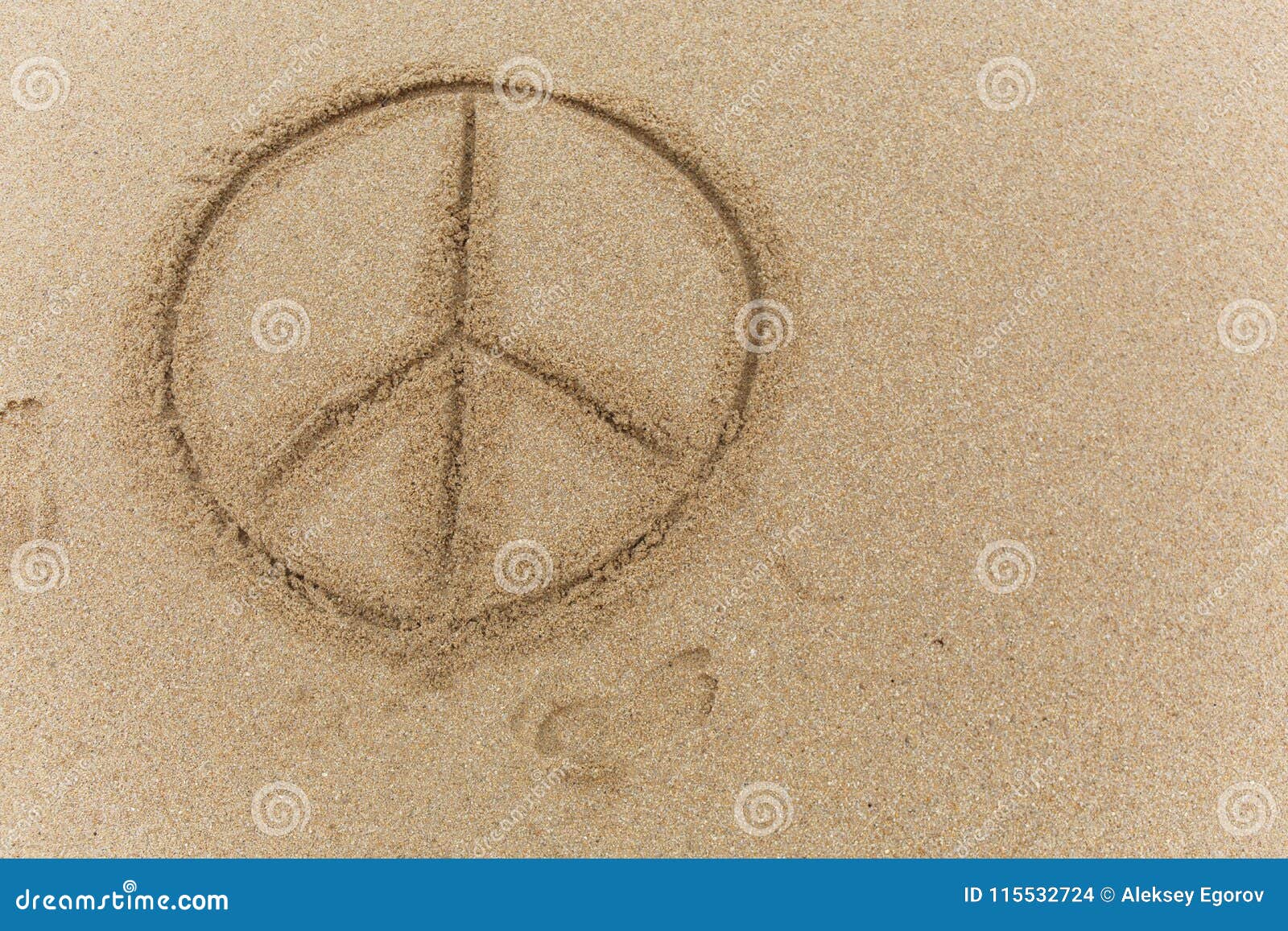 Peace sign on the sand stock photo. Image of nature - 115532724