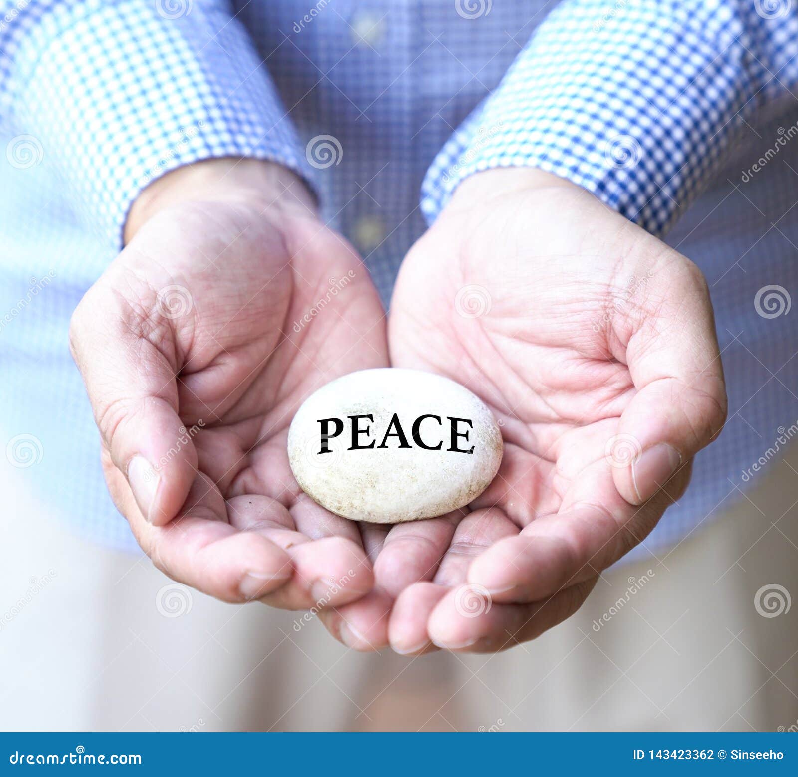 Peace on white pebble stock photo. Image of quotes, peace - 143423362