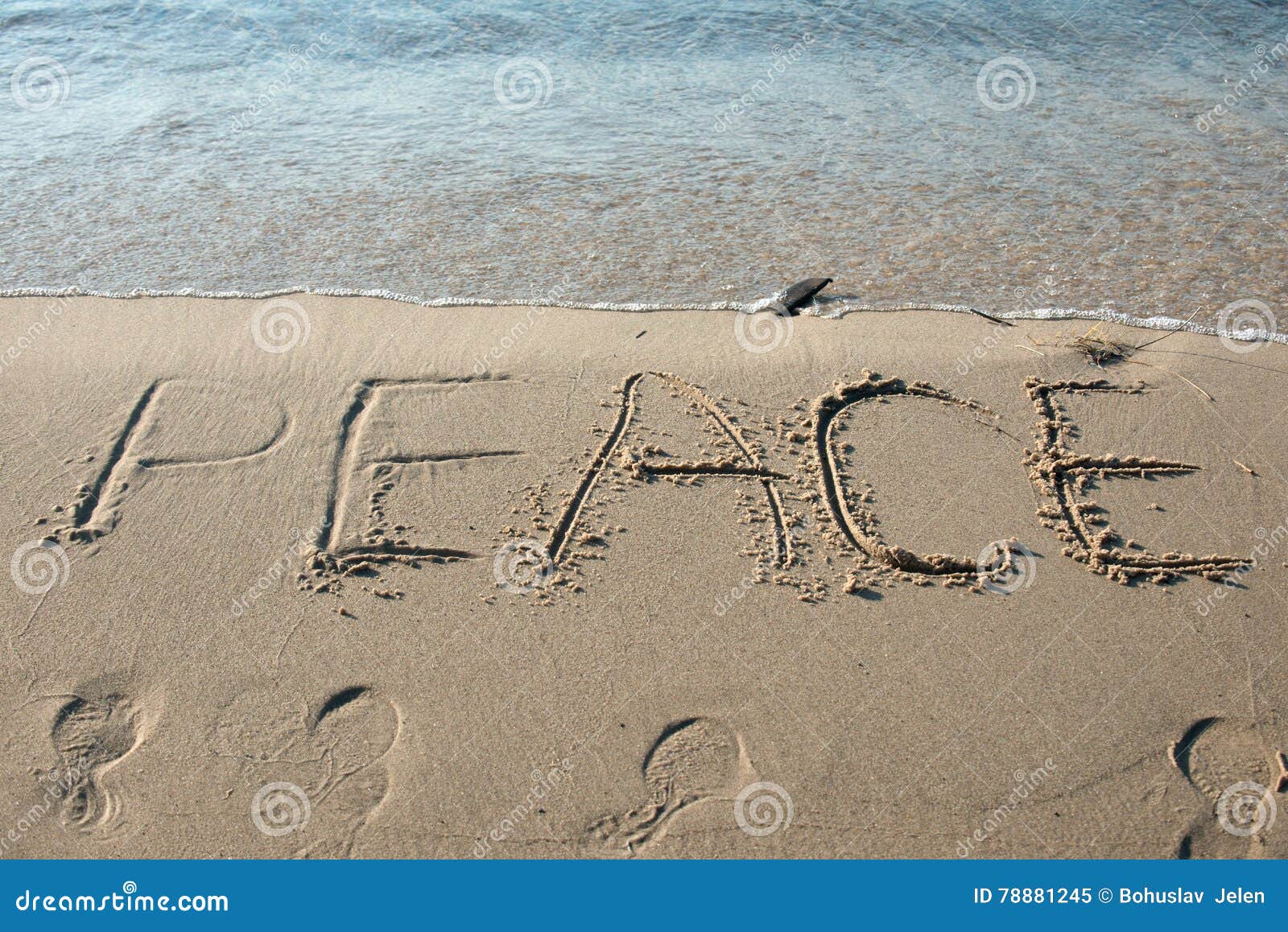 Peace written in the sand stock image. Image of letter - 78881245