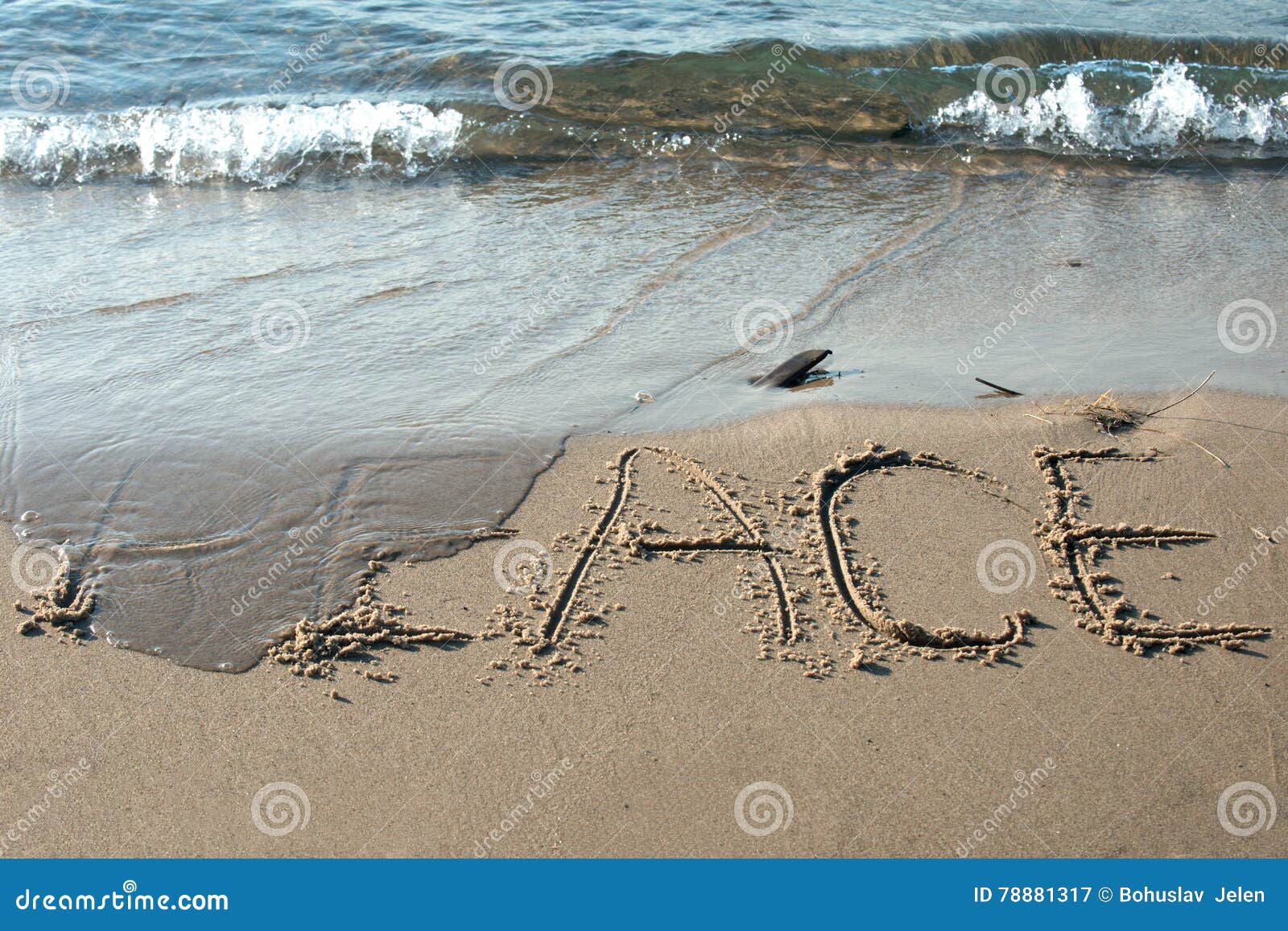 Peace written in the sand stock image. Image of concept - 78881317