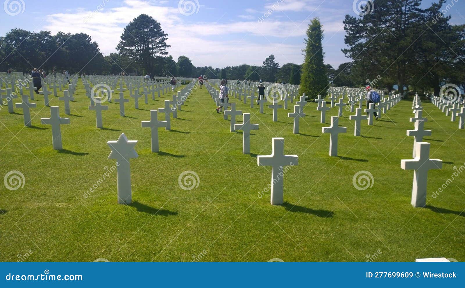 Peaceful Cemetery Scene Surrounded by Lush Green Grass and Trees Stock ...