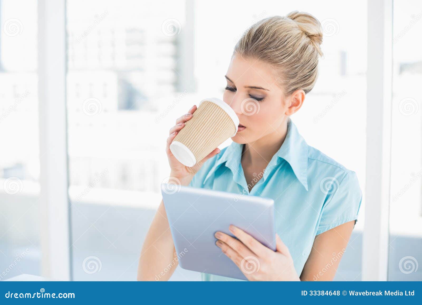 Peaceful Classy Woman Using Tablet while Drinking Coffee Stock Photo ...