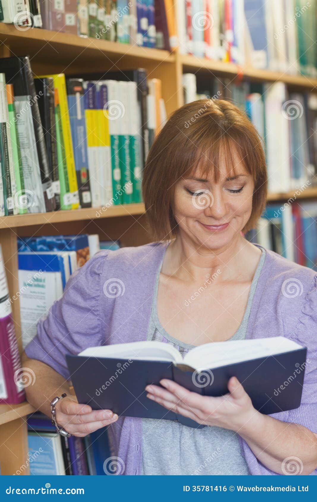 Peaceful Content Woman Reading a Book Stock Photo - Image of smiling ...