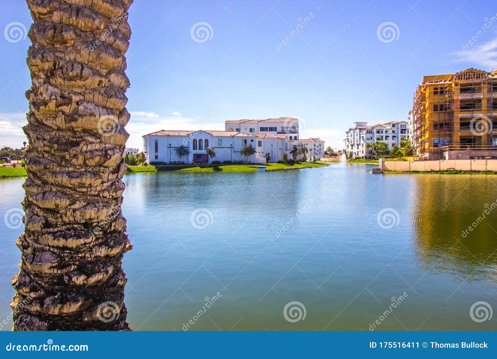 Peaceful Lagoon with Multi Story Buildings Stock Image - Image of site ...