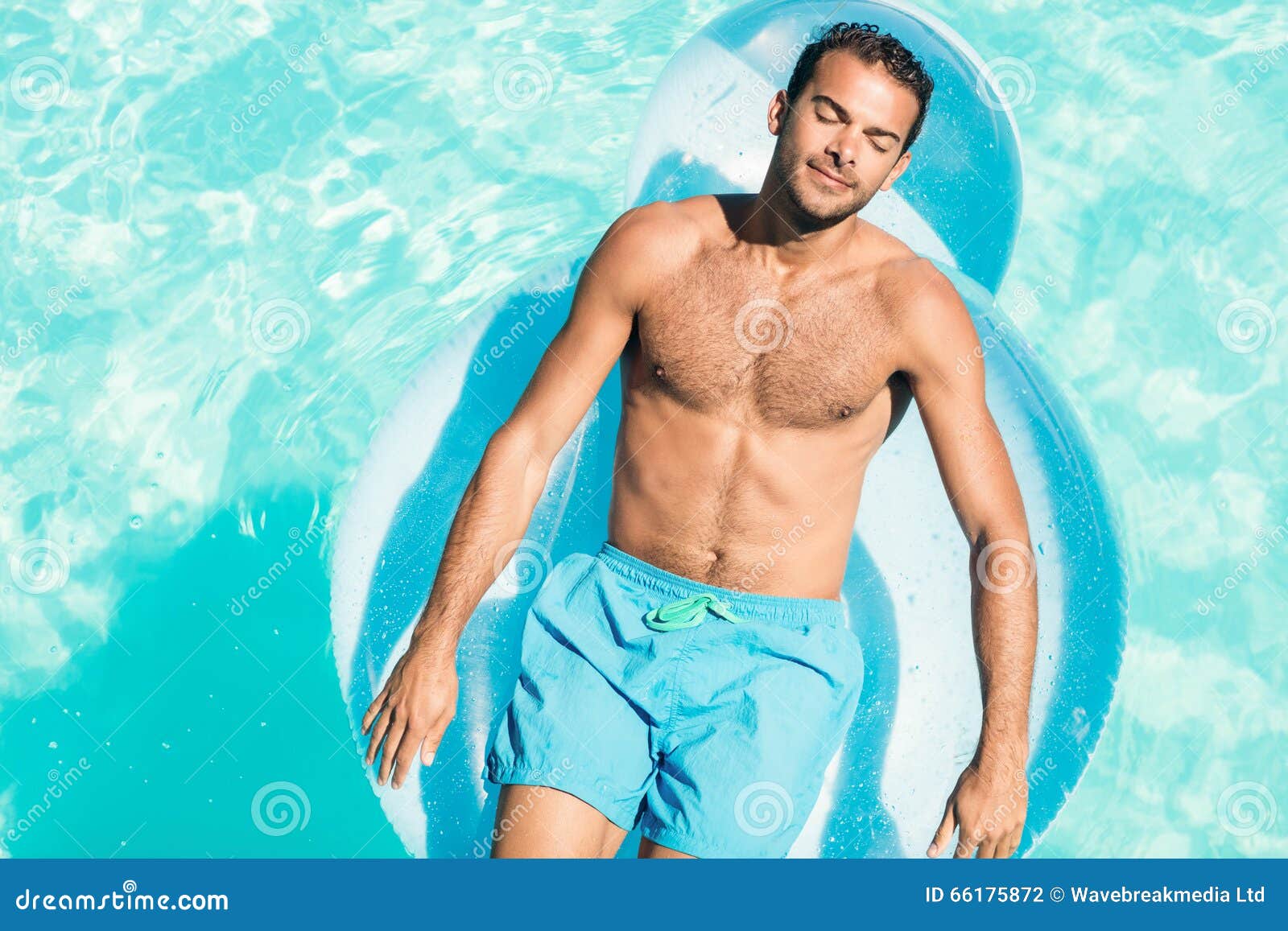 Peaceful man on lilo stock photo. Image of male, holiday - 66175872
