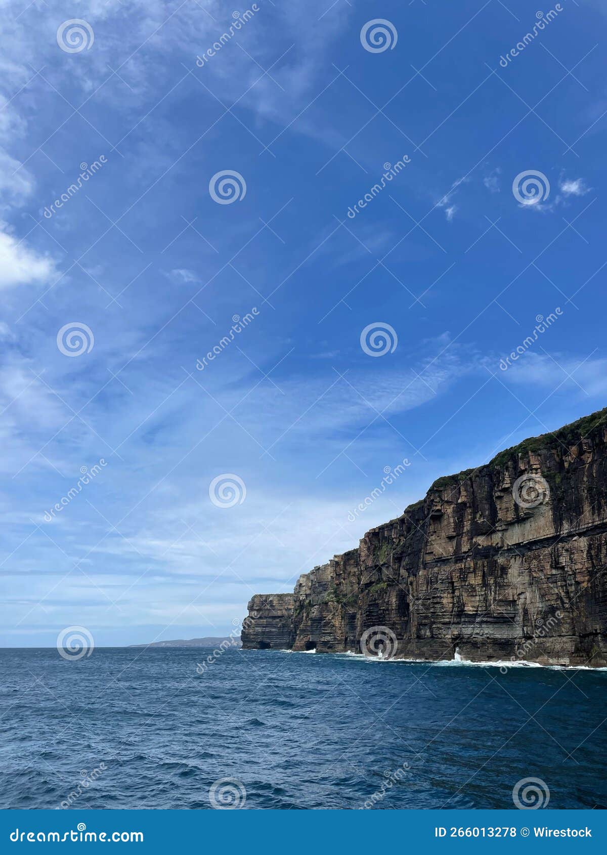 Peaceful Ocean Meeting a Perpendicular Cliff Stock Photo - Image of ...