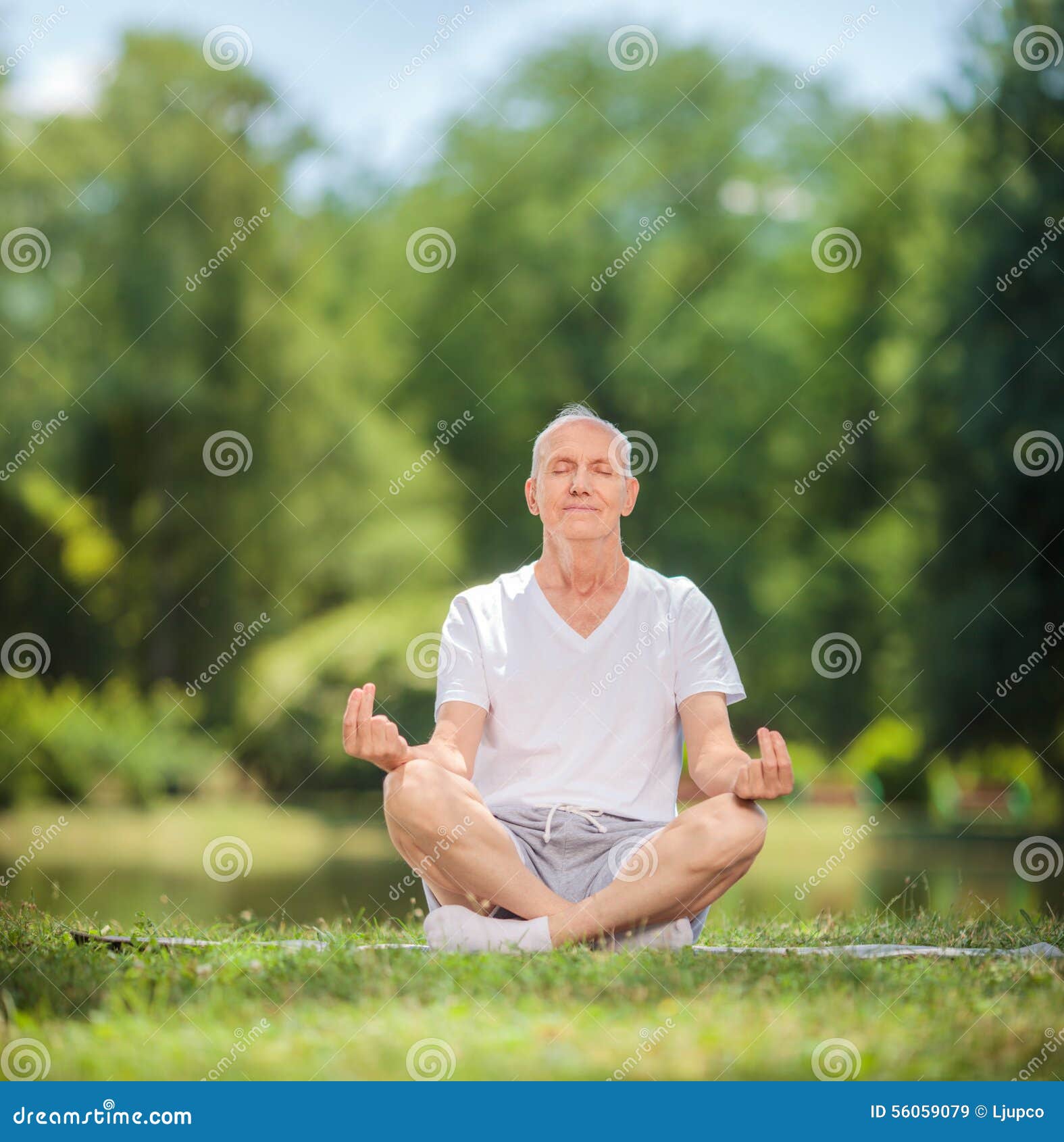Peaceful Senior Man Meditating Seated In A Park Stock Image Image Of