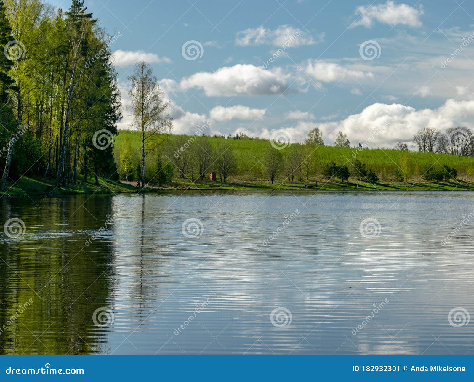Peaceful Spring Landscape with a Clear Lake and Beautiful Reflections ...