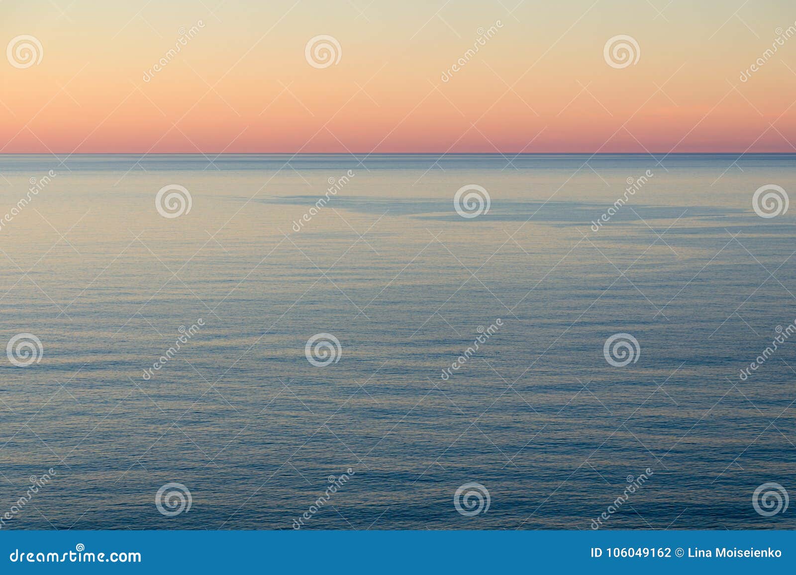 Peaceful Sunset by the Sea. Calm Water, Bright Sky. Stock Photo - Image ...