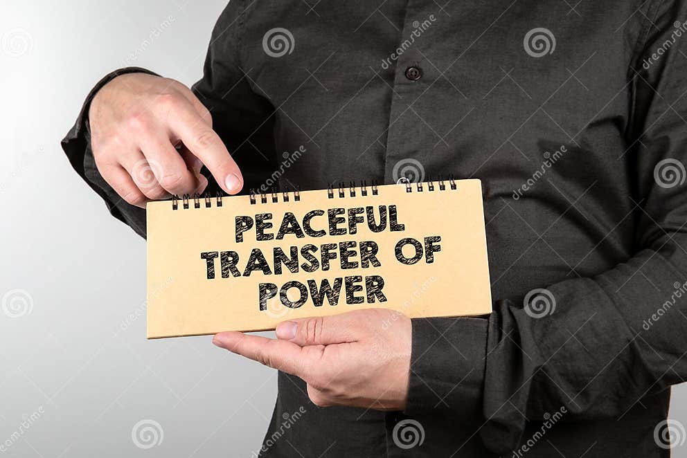 Peaceful Transfer of Power. Man with Notepad in Hands Stock Photo ...