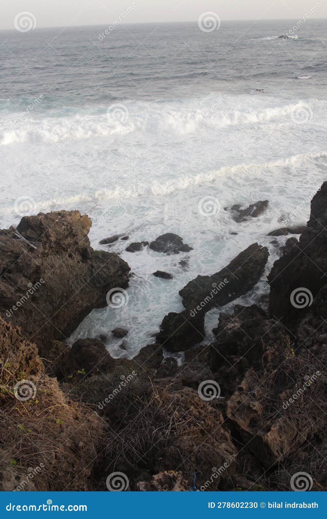 Peaceful yet Unnerving Cliff Stock Photo - Image of beach, nature ...