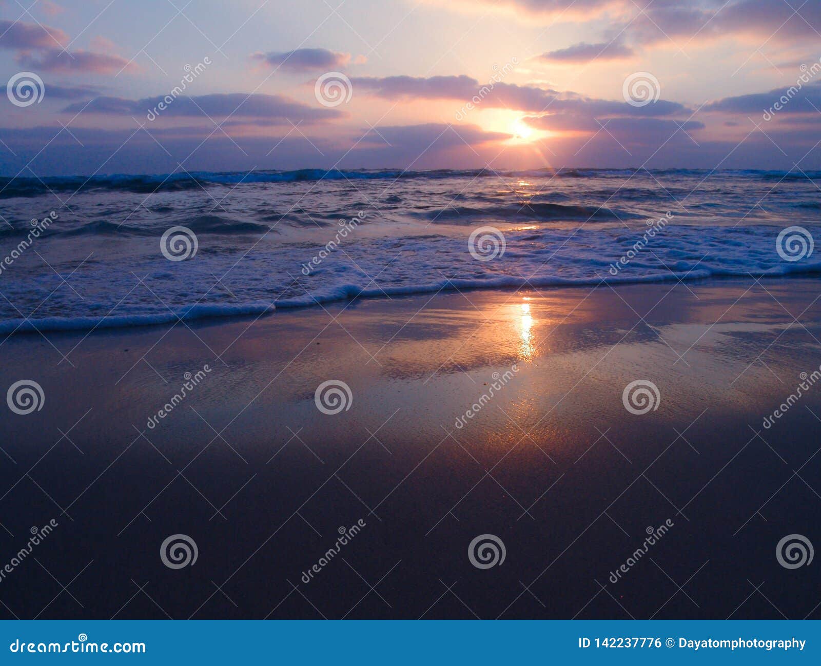 Peaceful View of a Cloudy Sunset on Sandy Beach with Beautiful ...
