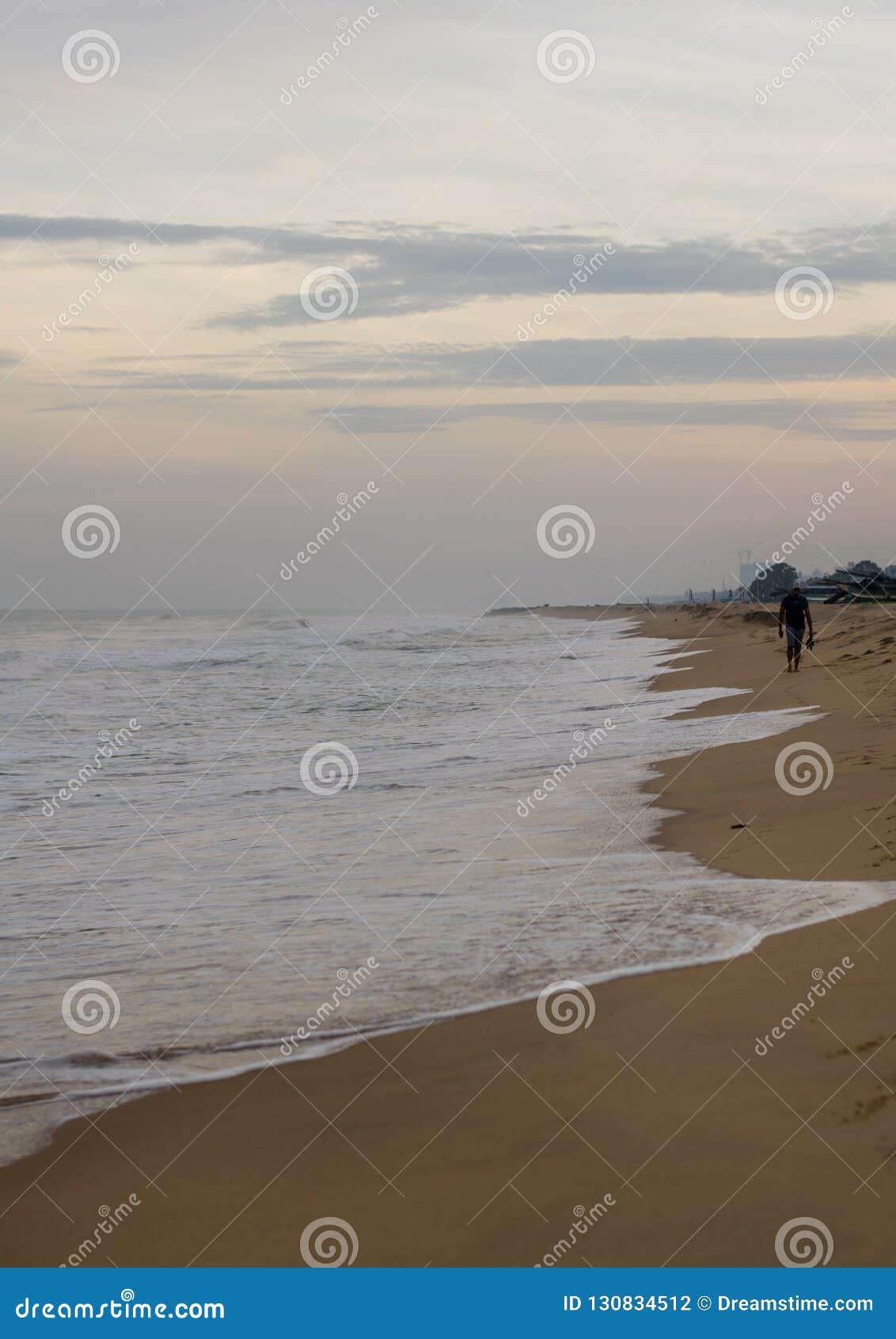 Peaceful walk at beach editorial photography. Image of peaceful - 130834512