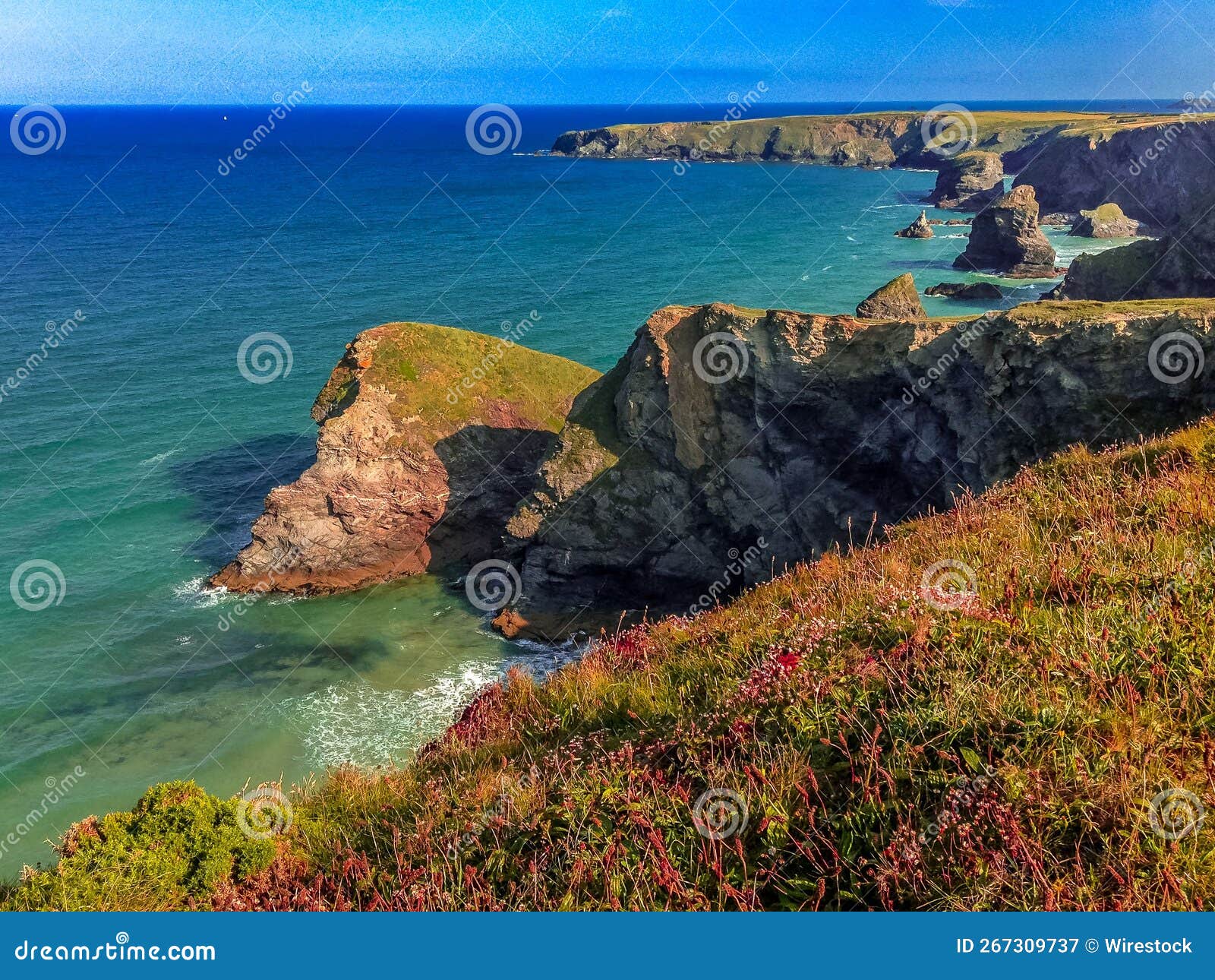 Waves Splashing Against a Boulder in the Sea Stock Image - Image of ...