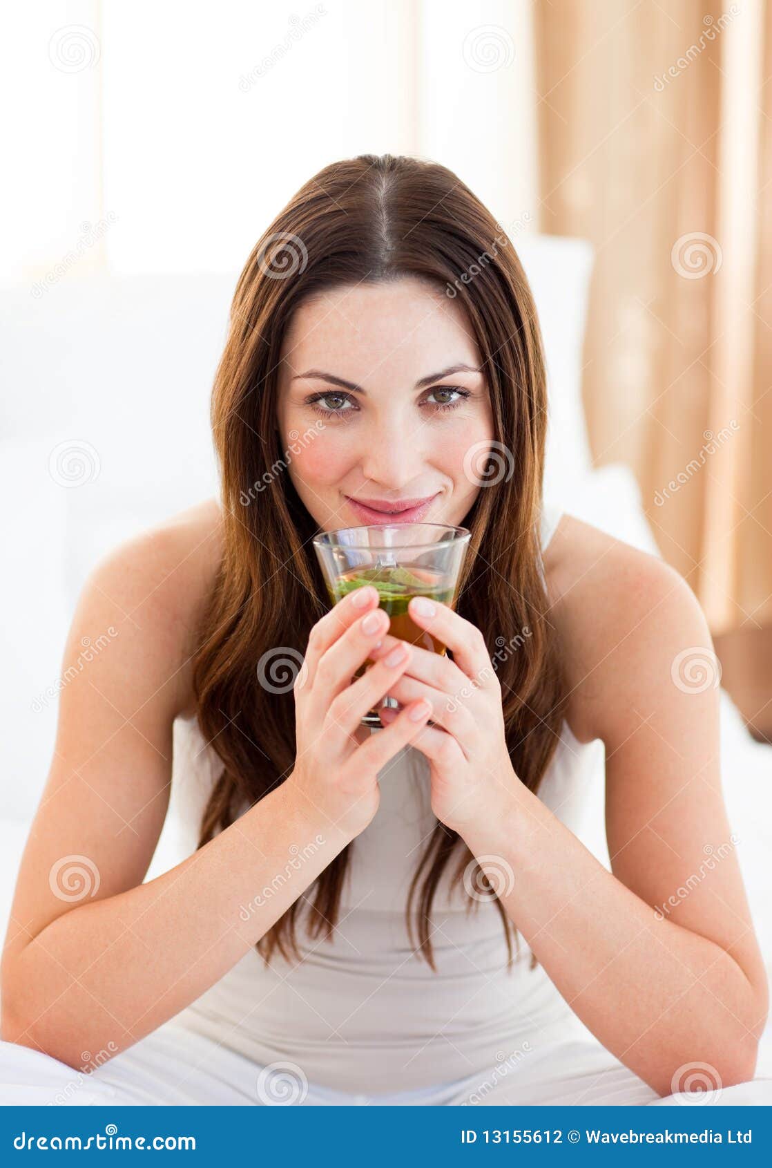 Peaceful Woman Drinking Tea Sitting on Bed Stock Photo - Image of ...