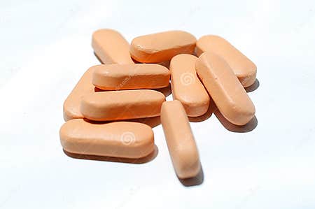 Peach Colour Pills on a White Background Stock Photo - Image of drug ...