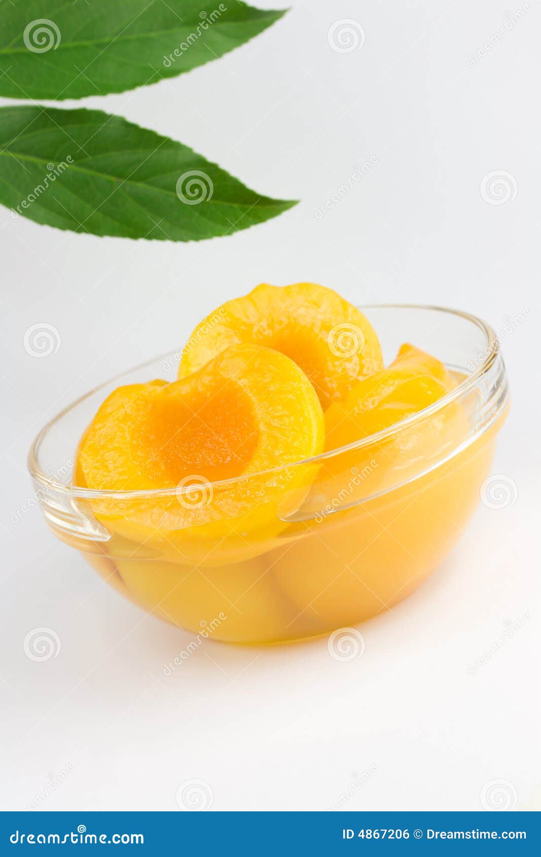 Peach halves in syrup stock photo. Image of color, natural - 4867206
