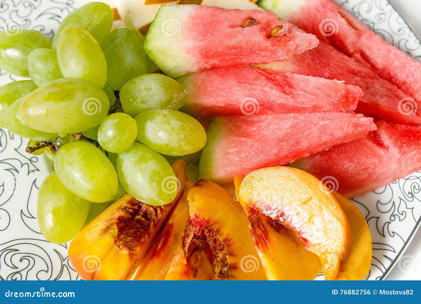 Peach, White Grape, Watermelon and Melon on the Plate Stock Photo ...