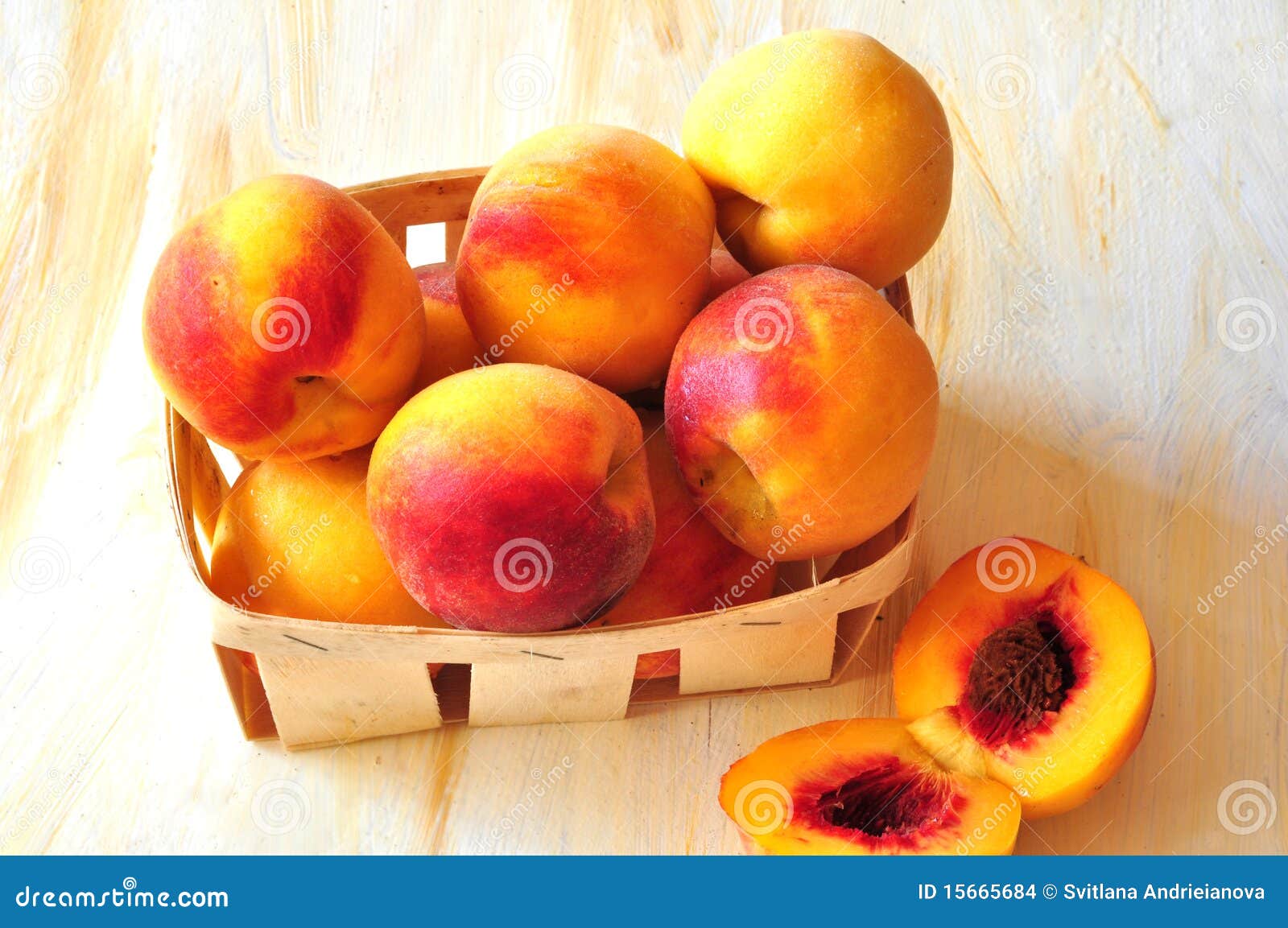 Peaches are in a Small Basket Stock Photo - Image of fruit, halves ...