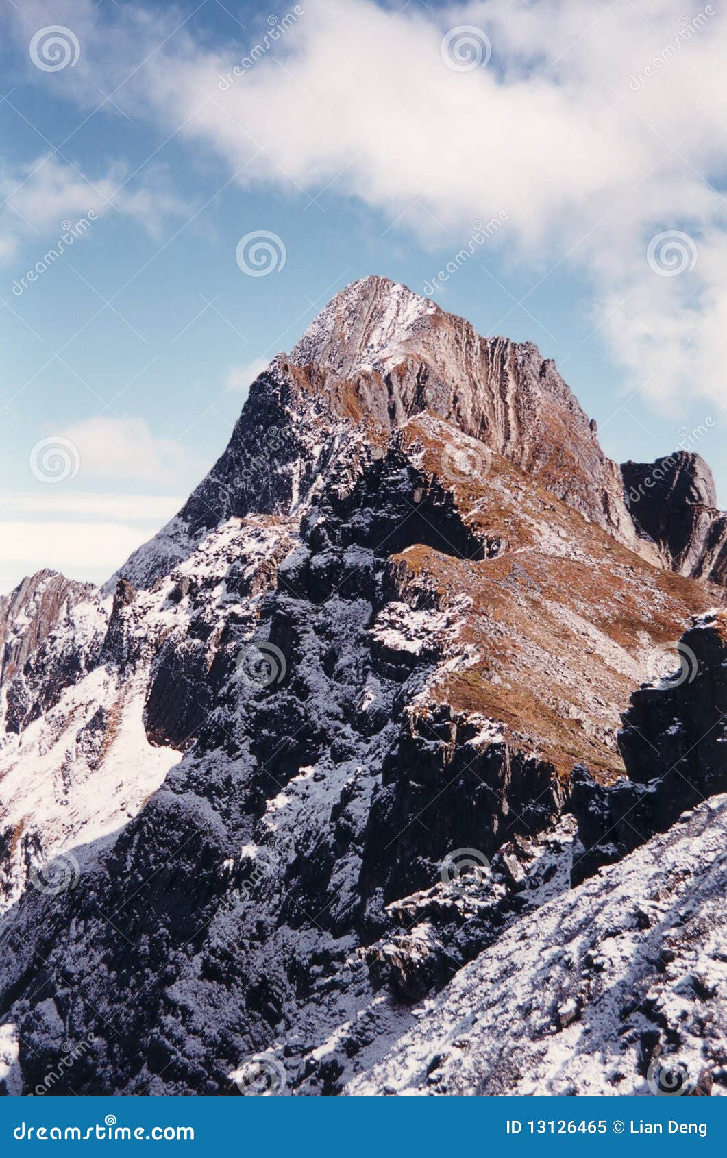 Peak stock image. Image of blue, fall, landforms, cloud - 13126465