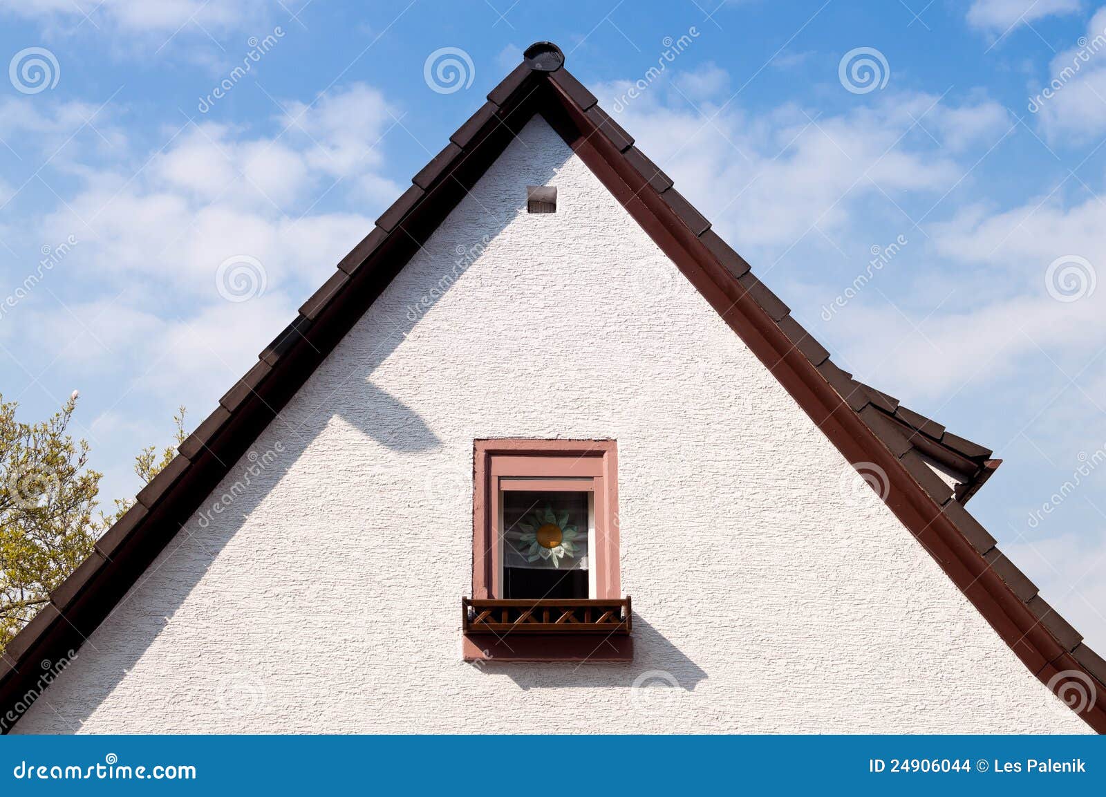 Peak roof and a window stock photo. Image of sunflower - 24906044