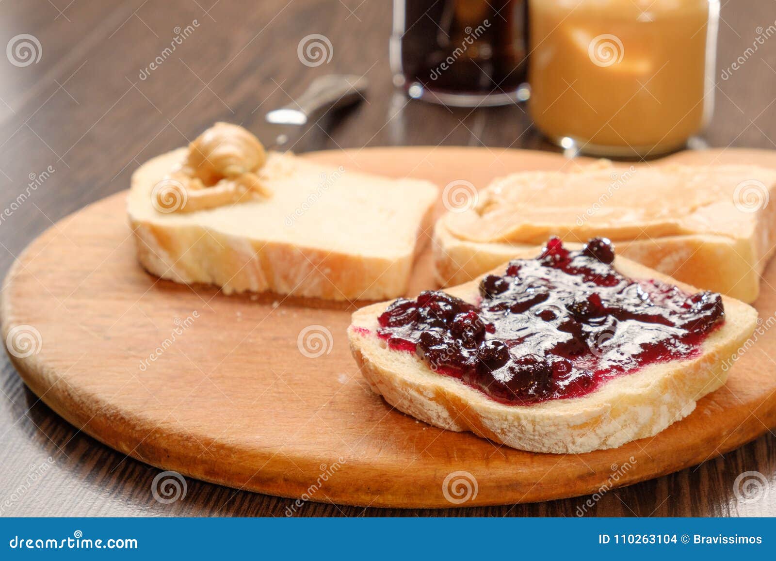 Peanut Butter Sandwich with Jam on Cutting Board Stock Photo - Image of ...